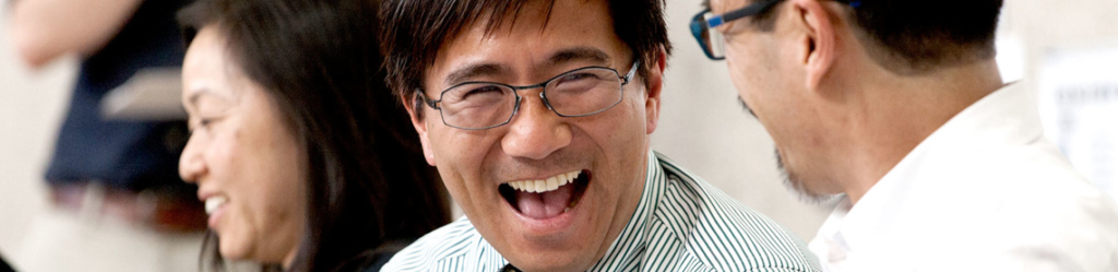 API Council Members Laughing During Event – top-image – API Council